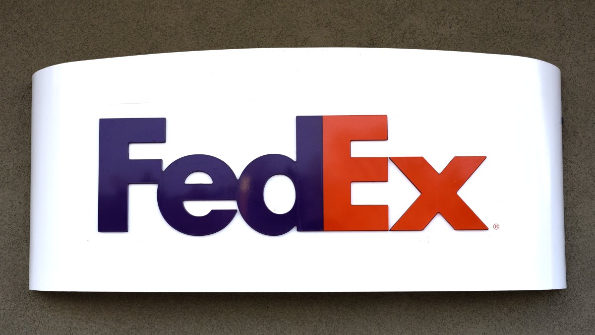 FedEx to Close Stores, Pause Hiring as Demand for Package Deliveries ...