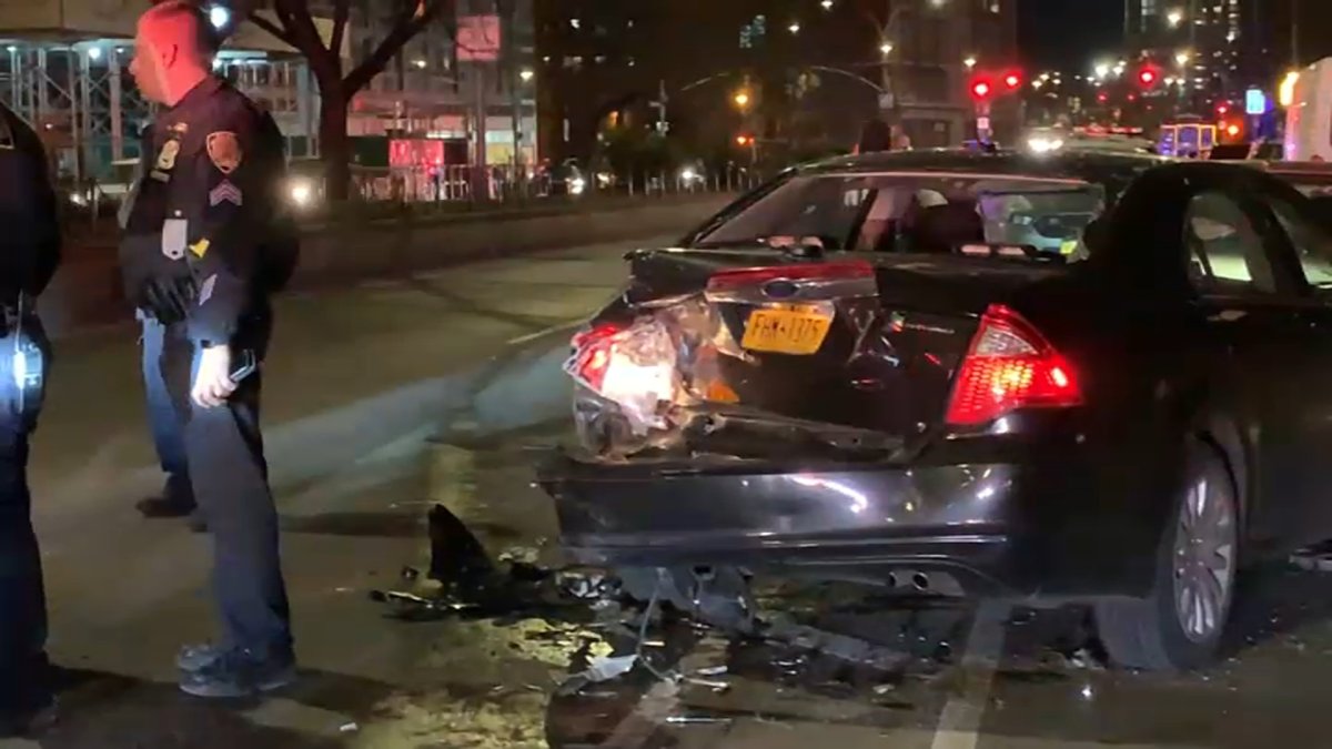 NYPD Officer Gets Pinned Between Two Cars in Lower East Side Traffic ...