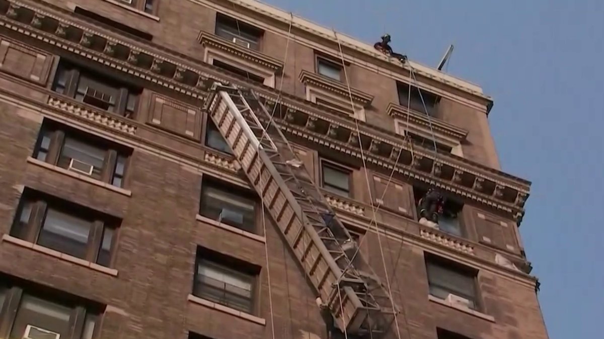 Workers Saved After Scaffold Malfunction Left Them Clinging for Life ...