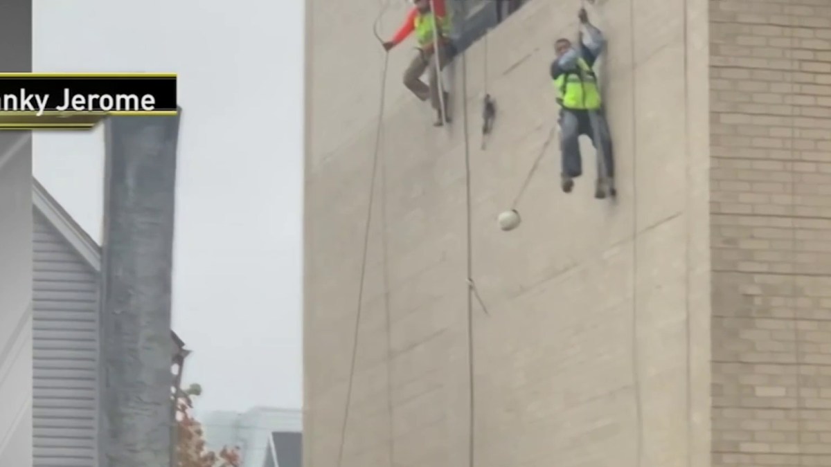 Worker Left Dangling from Building After Piece of Façade Crashes Into ...
