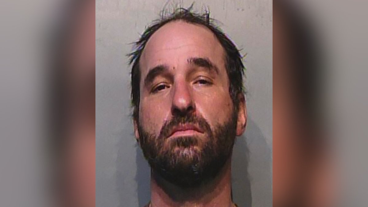 Iowa Conspiracy Theorist Stays in Custody, Ordered to DC – NBC New York