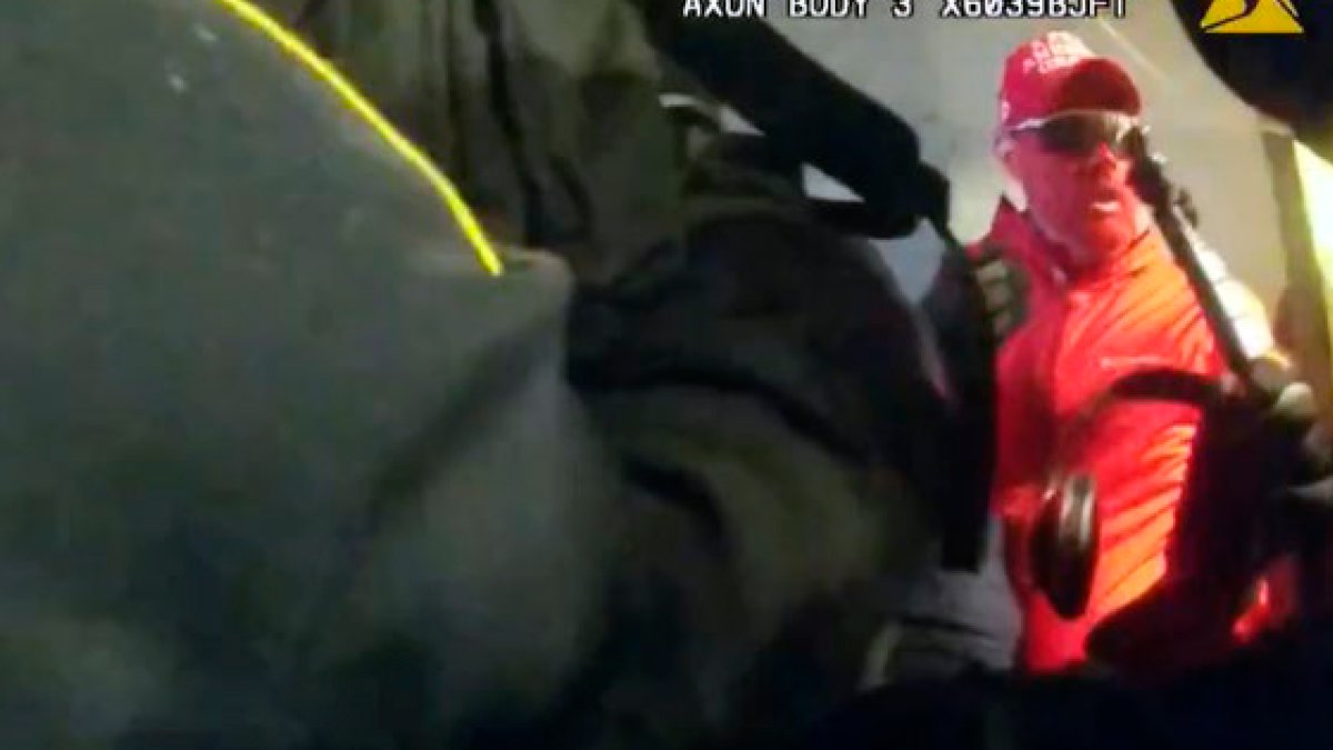 Man charged with joining Capitol riot in red face paint and Trump hat ...