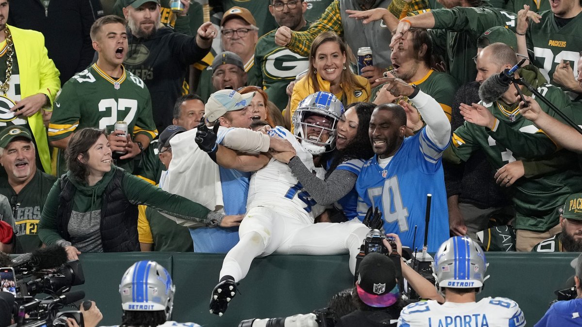 Packers fan pours beer on Lions’ Amon-Ra St. Brown after ‘Lambeau Leap ...