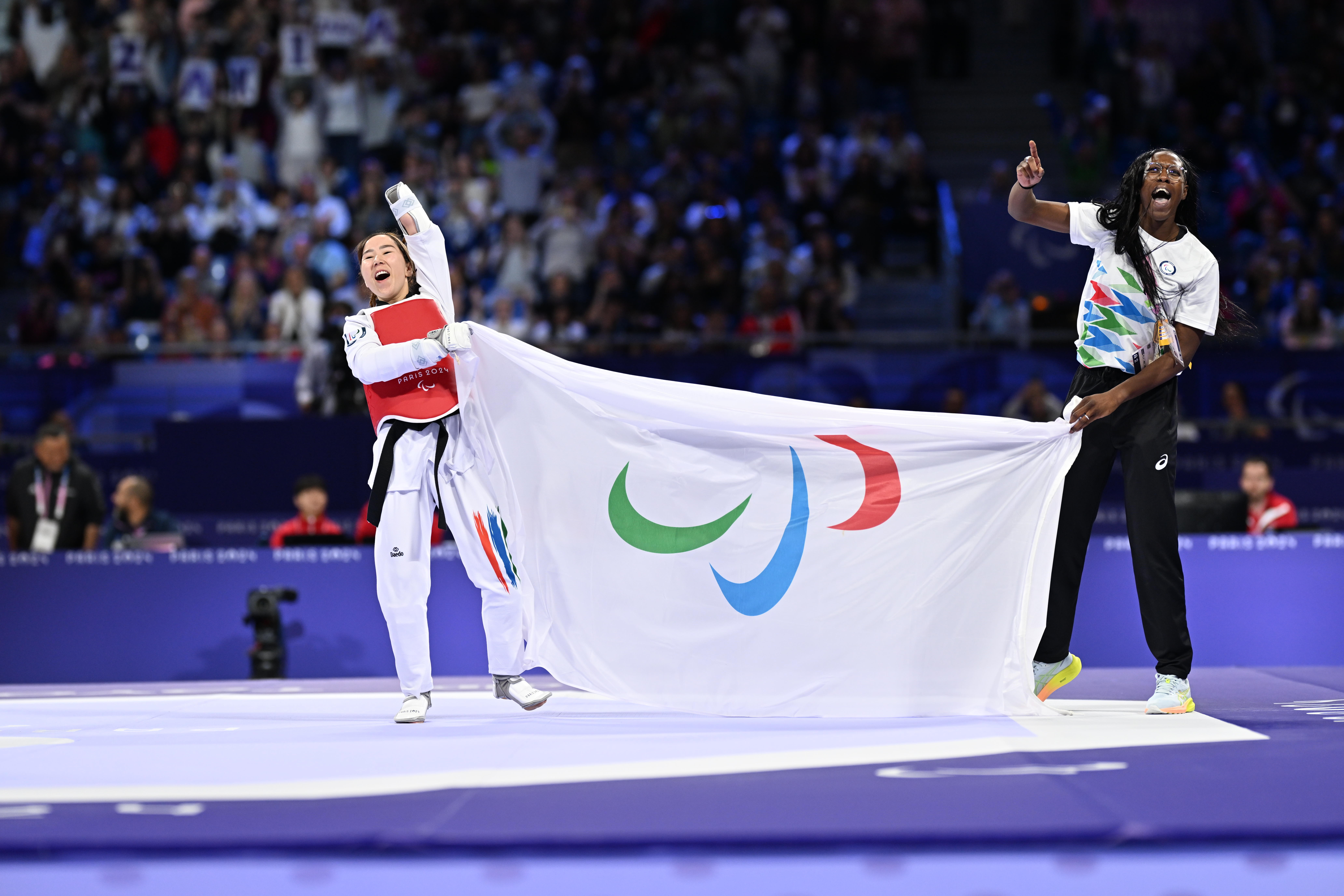 Afghan taekwondo para-athlete makes history for Refugee Paralympic Team ...