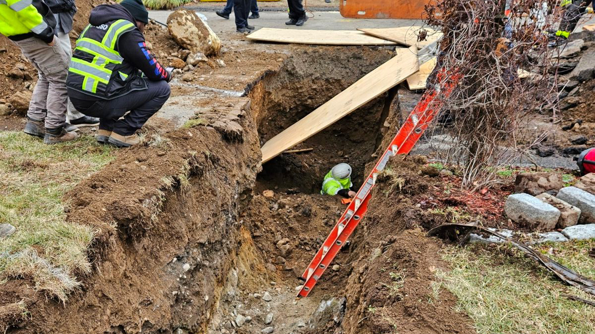 Firefighters free worker buried in trench collapse in Stamford, Conn ...