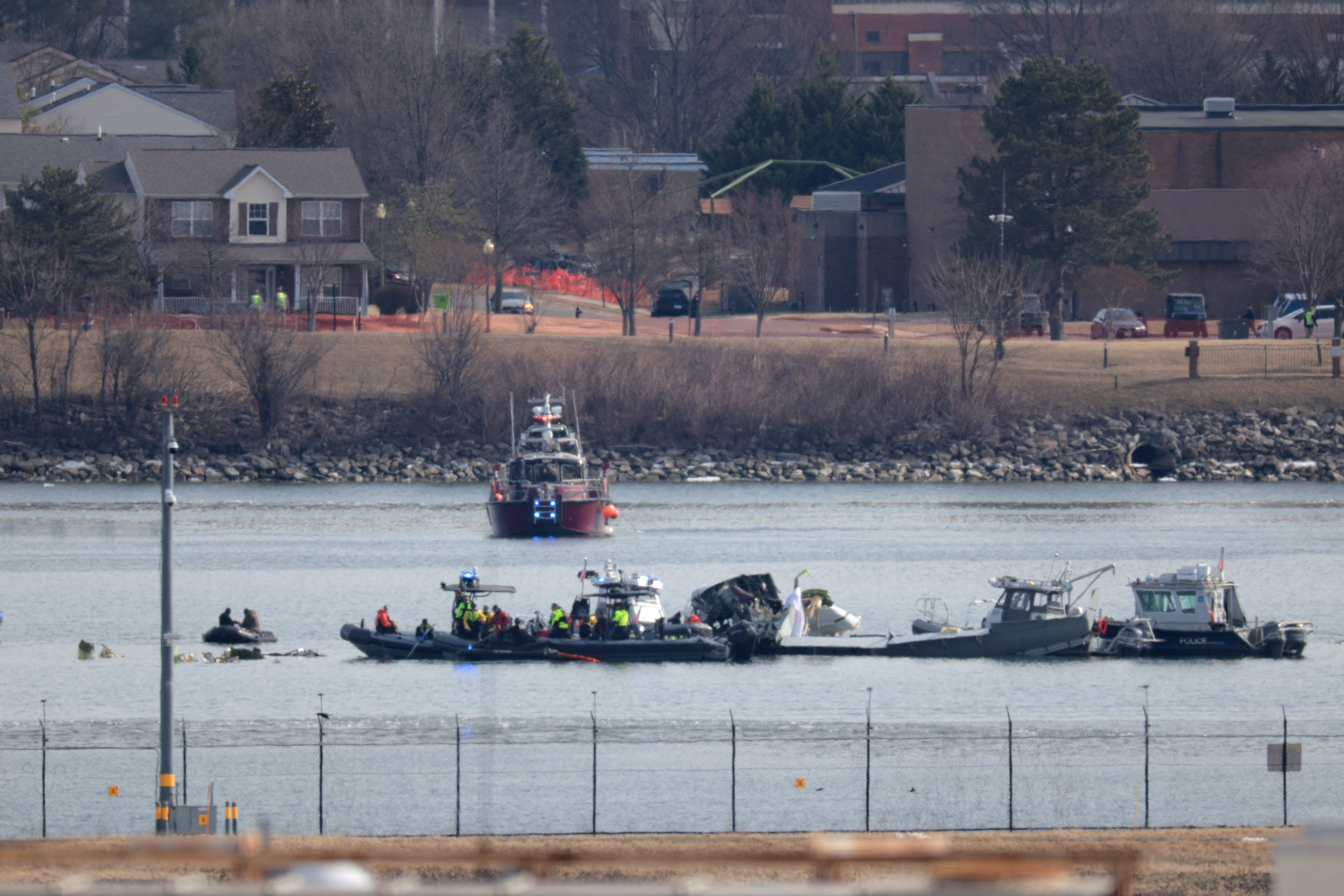 Photos: See aftermath of plane, helicopter crash in Potomac River – NBC ...