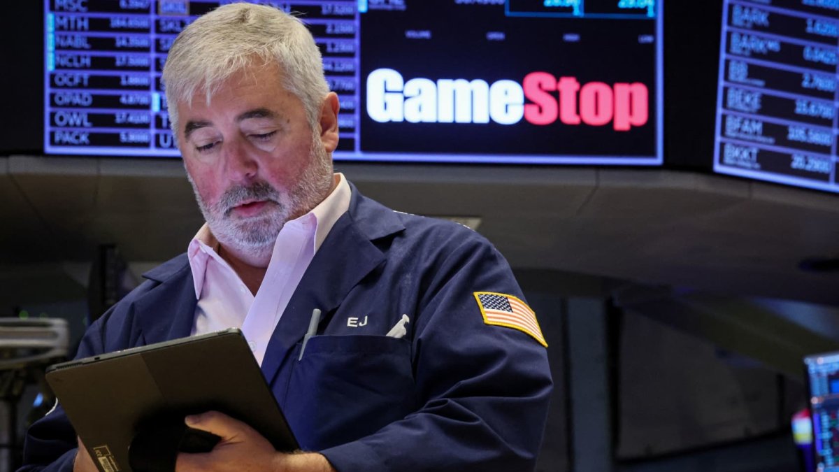 GameStop shares drop 22% after the retailer issues debt to buy bitcoin ...