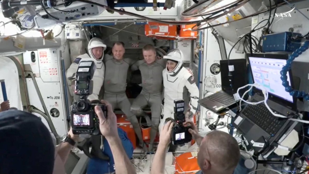 Watch NASA astronauts return to Earth on SpaceX capsule after months on ...