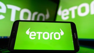 Stock and crypto trading site eToro prices IPO at $52 per share ahead ...