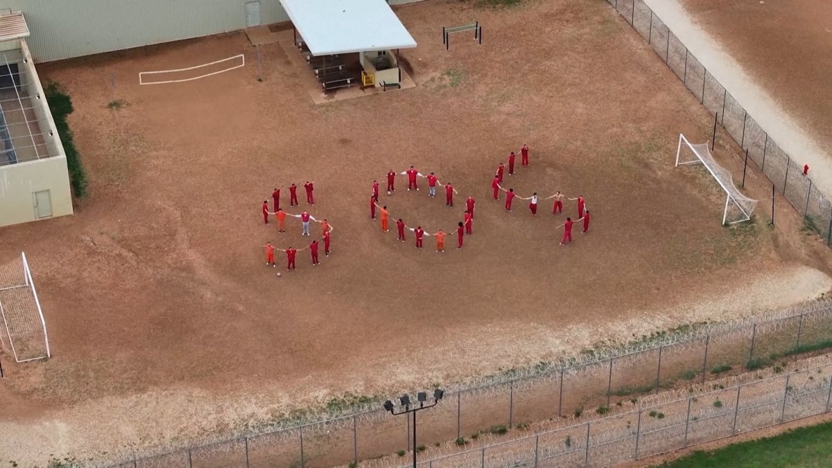 Venezuelan migrants at a Texas detention center form human SOS at ...