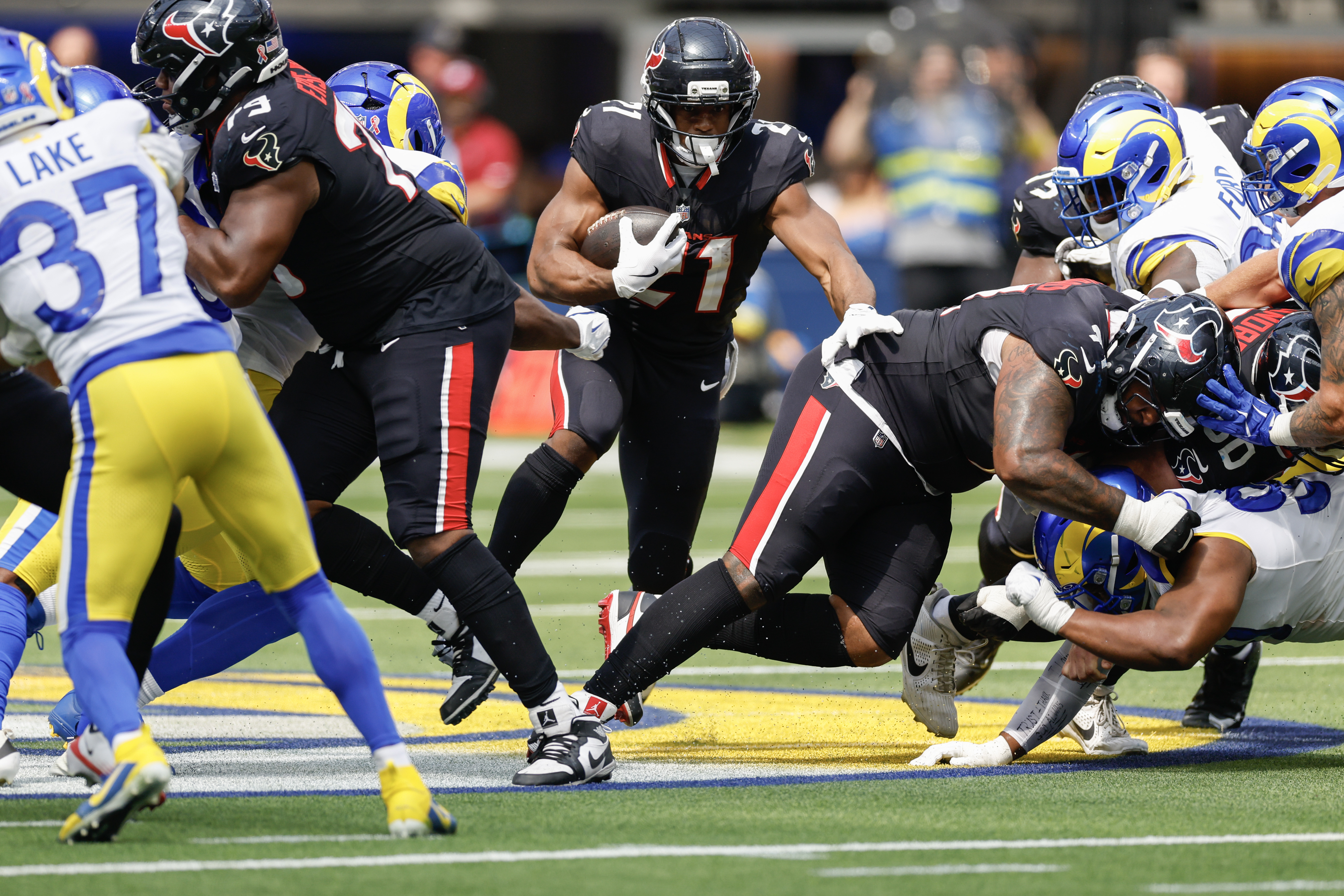 Woman at Rams-Texans game left bloodied after altercation in stands ...