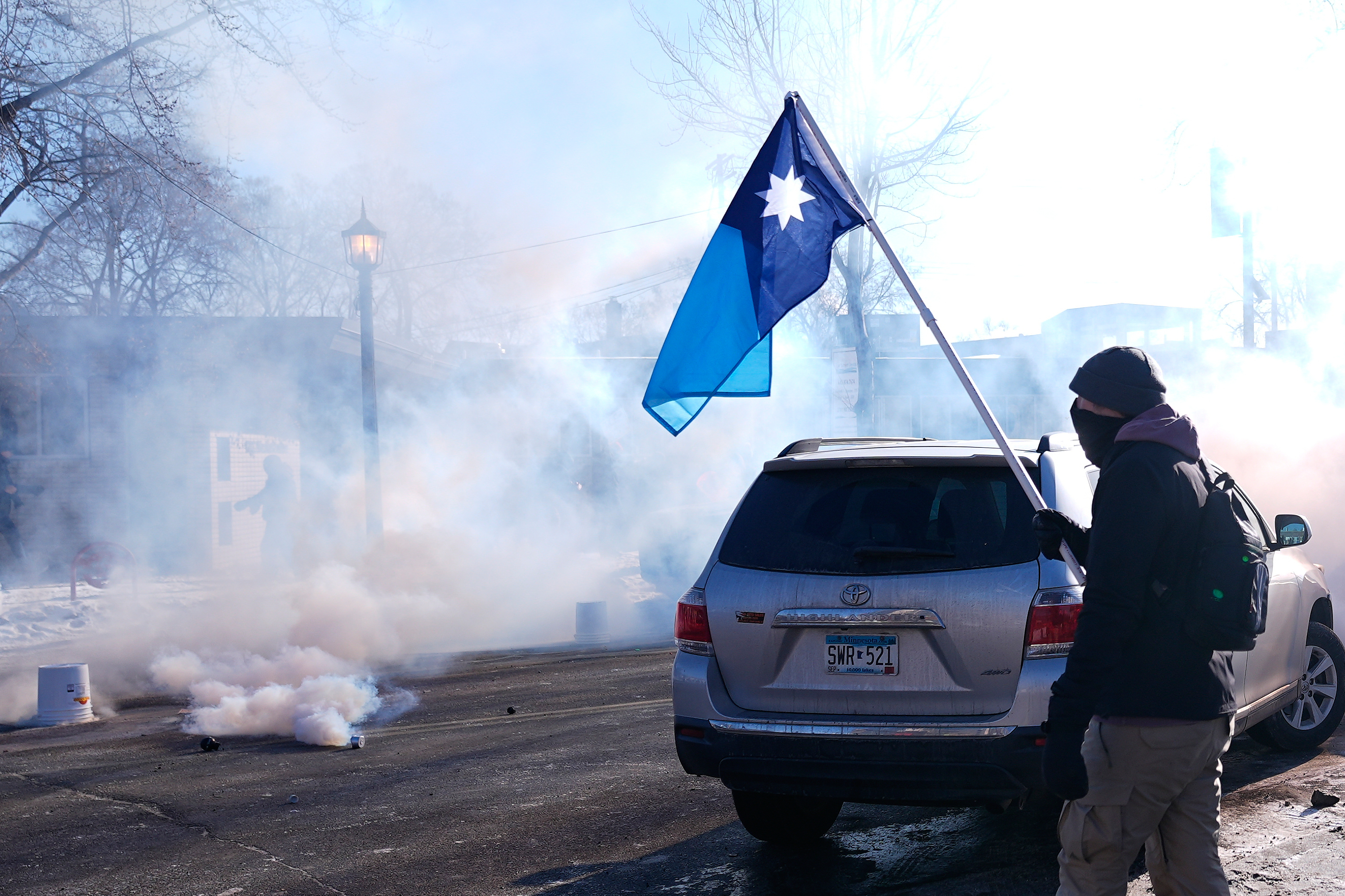 Photos: Officers react with crown after man killed in Minneapolis – NBC ...