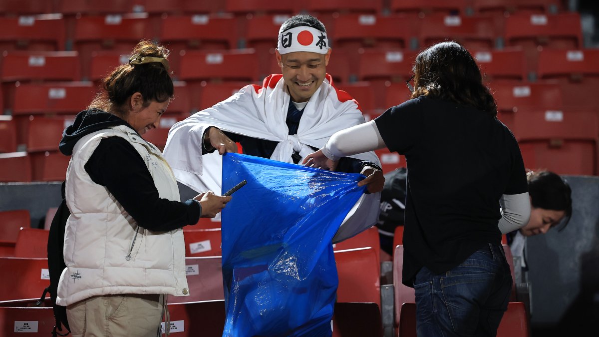 Why Japanese soccer fans clean up stadiums after World Cup games – NBC ...