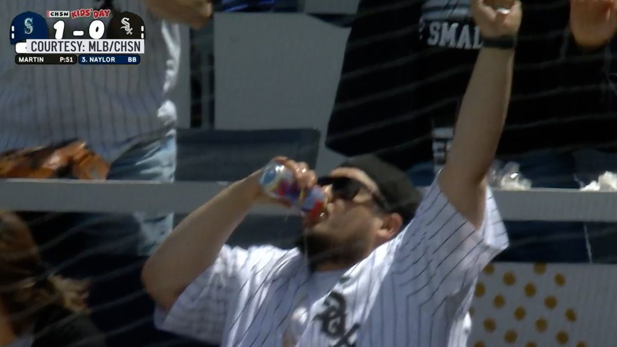 Watch a fan react quickly after his beer is knocked over – NBC New York